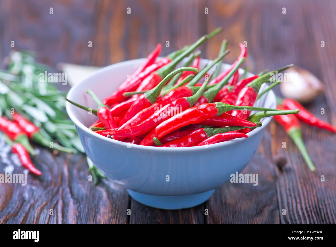 red hot chilli with salt and aroma spice on a table Stock Photo - Alamy