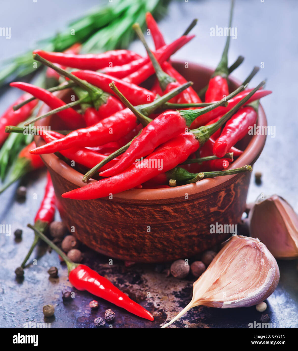 red hot chilli with salt and aroma spice on a table Stock Photo - Alamy