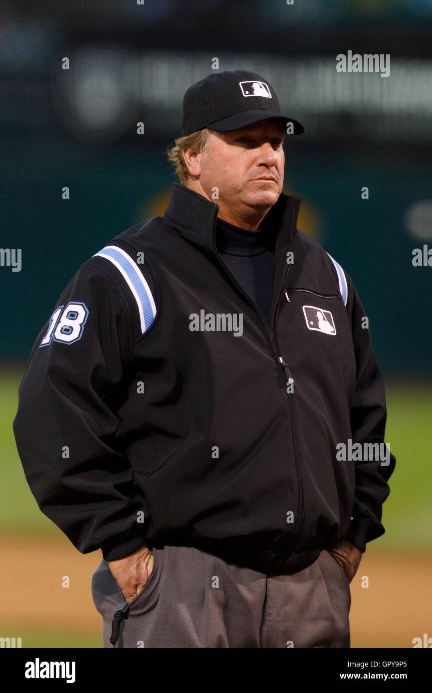 May 17, 2011; Oakland, CA, USA; MLB umpire Brian Runge (18) stands ...