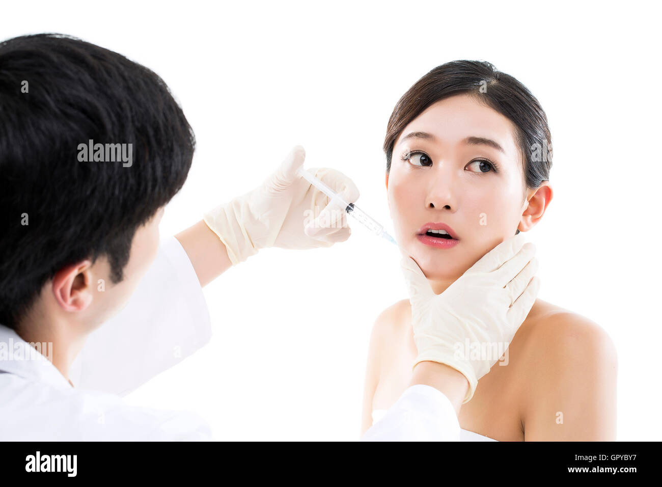 Korean woman receiving injection hi-res stock photography and images ...