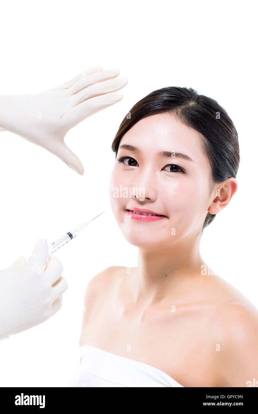 Cosmetic injection on her chin hi-res stock photography and images - Alamy