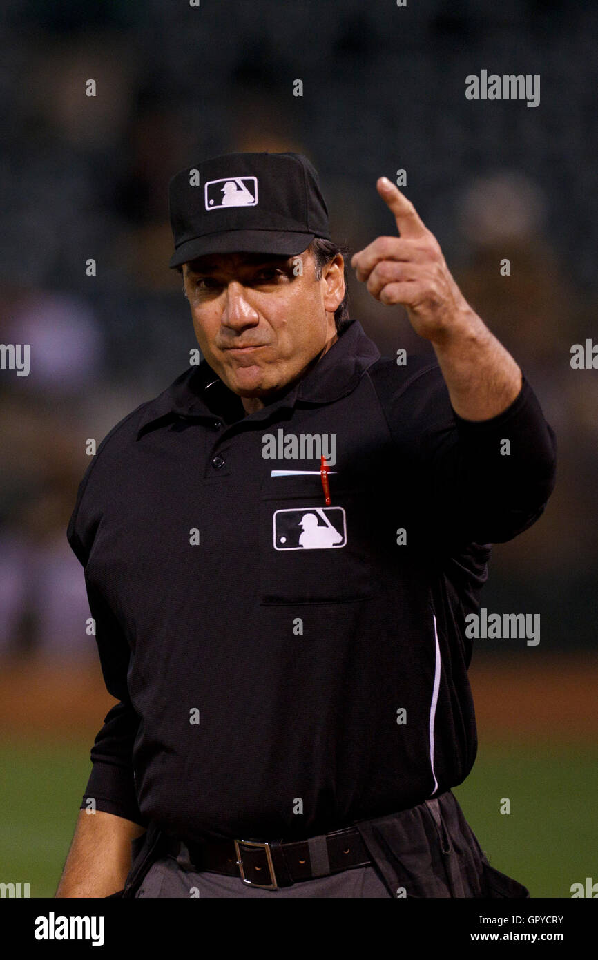 June 28, 2011; Oakland, CA, USA; MLB umpire Phil Cuzzi (10) stands ...
