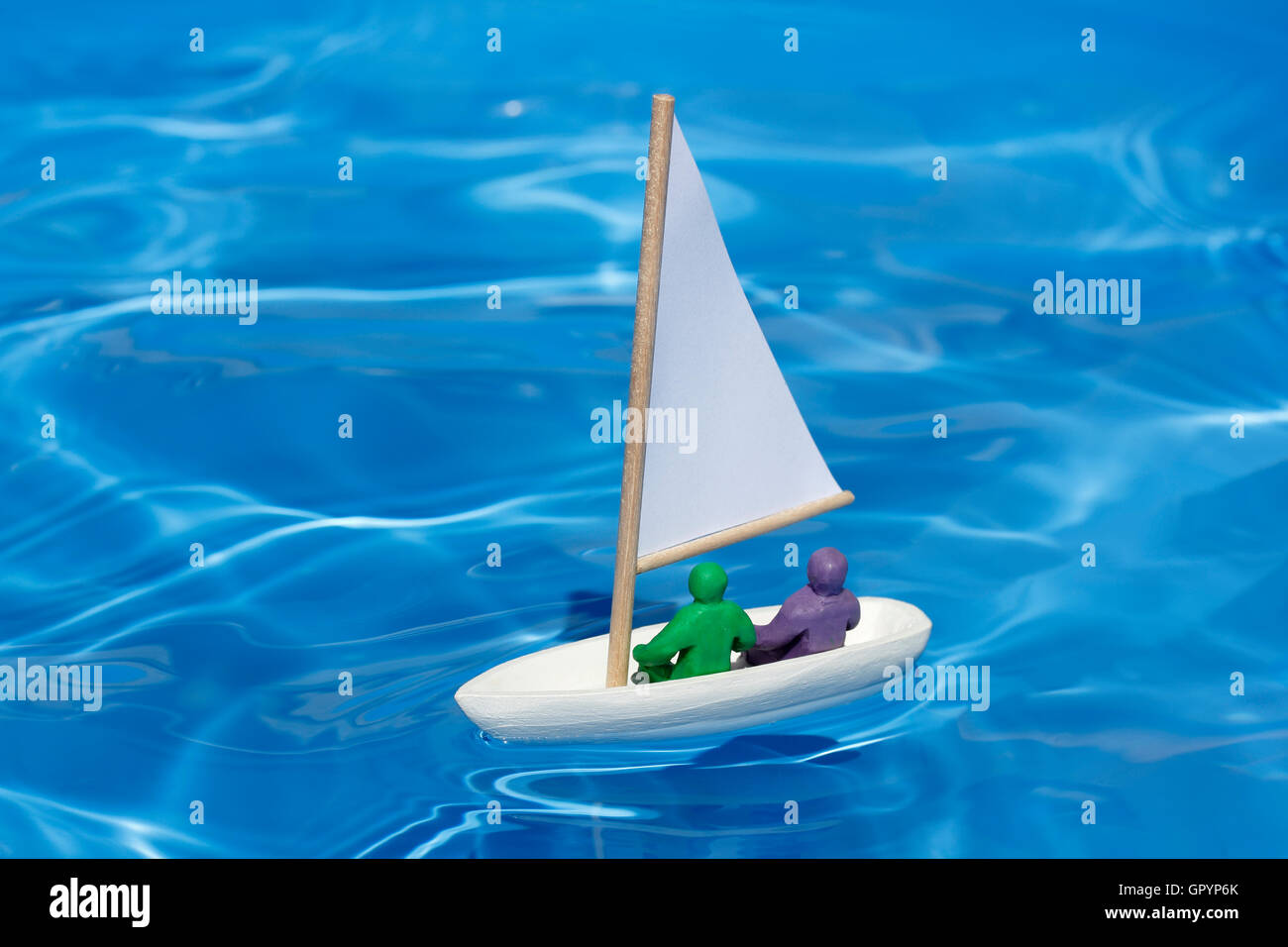 Two people paddling in wooden boat hi-res stock photography and images ...