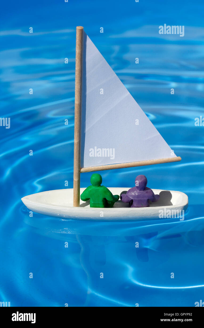 Two people paddling in wooden boat hi-res stock photography and images ...