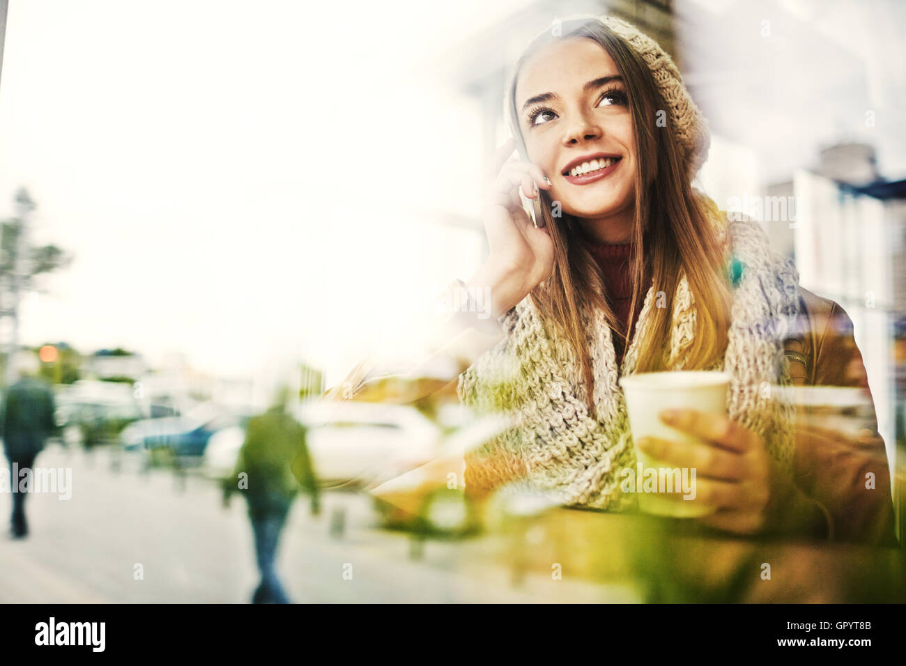 Delightful Phone Conversation in Cafe Stock Photo - Alamy