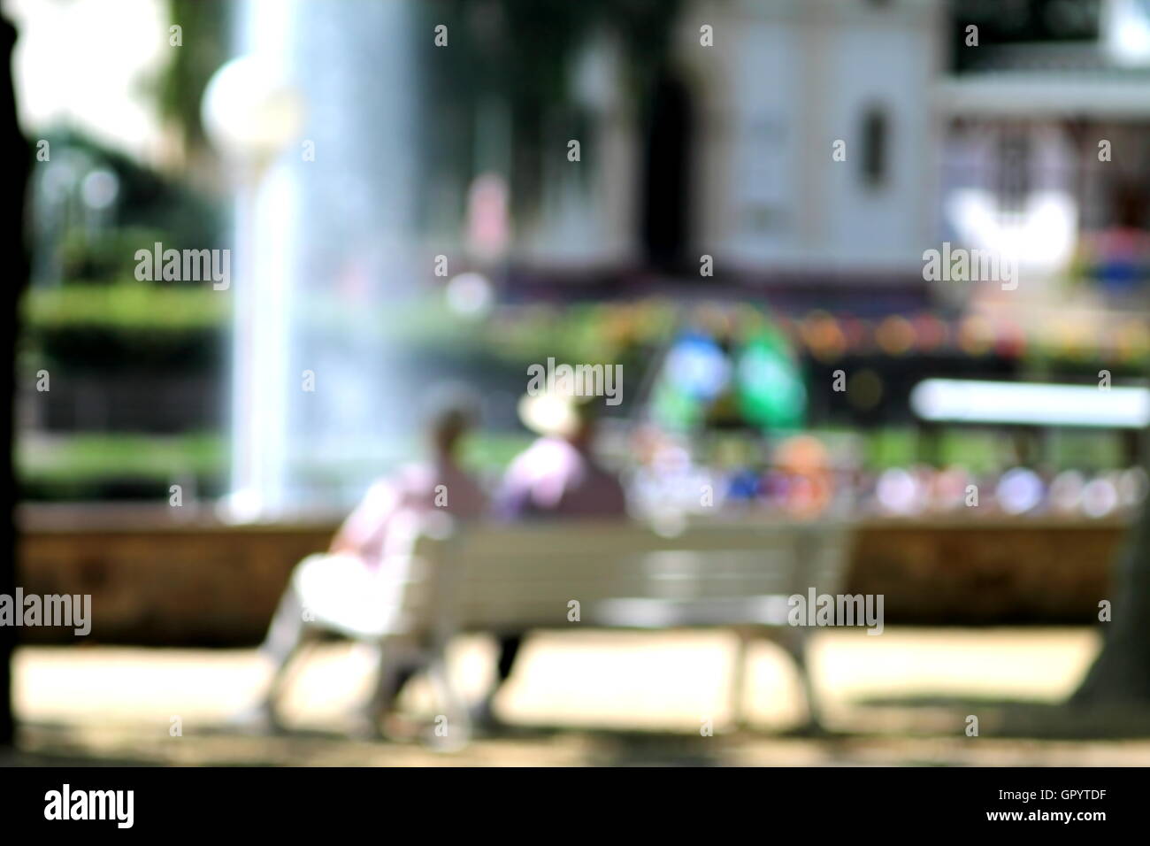 Abstract high key blurred image of couple on the bank Stock Photo - Alamy