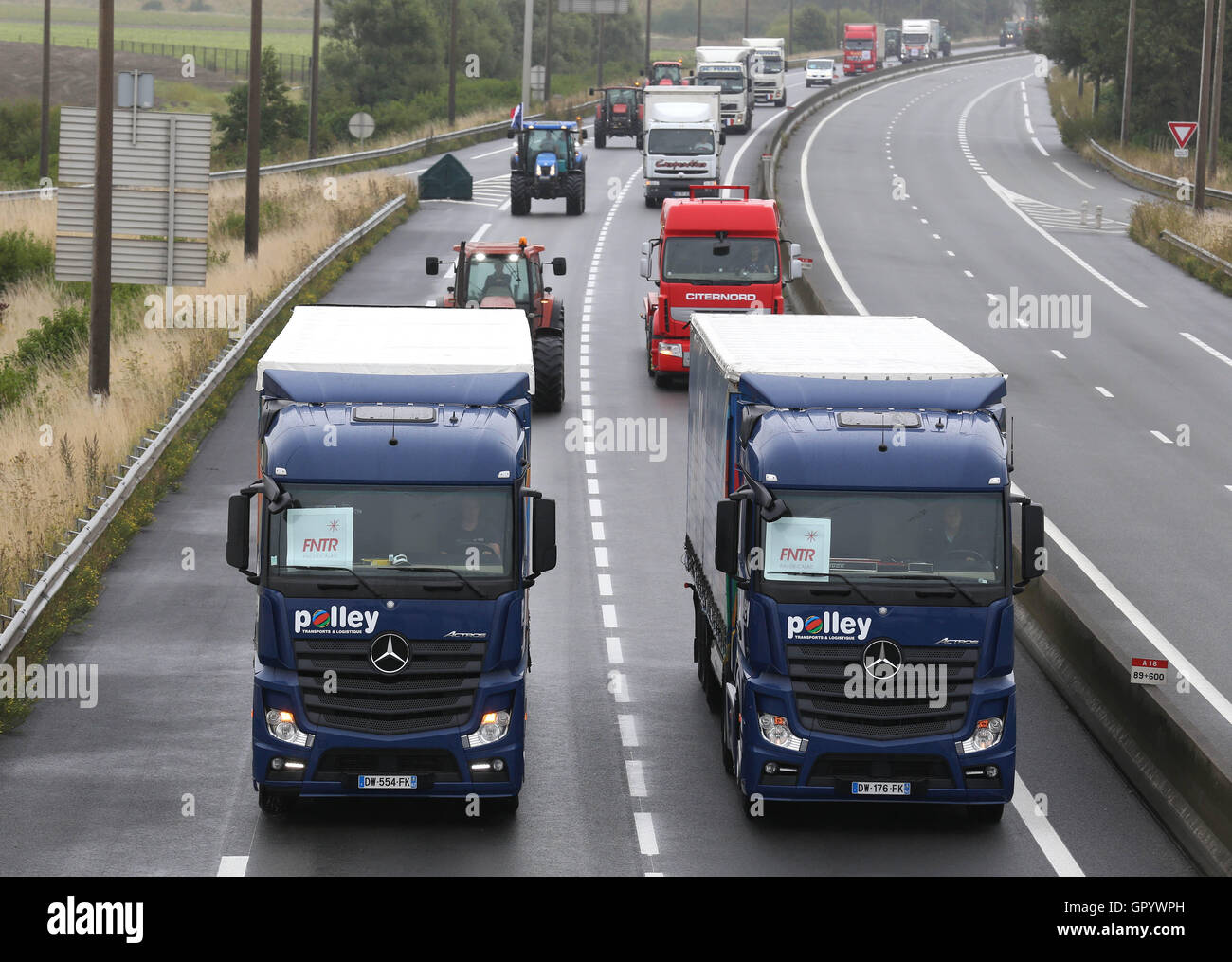 Lorry drivers join the blockade from a motorway junction along the A16 ...
