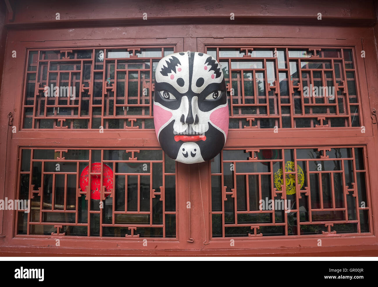 Beijing opera masks on a festive background Stock Photo - Alamy