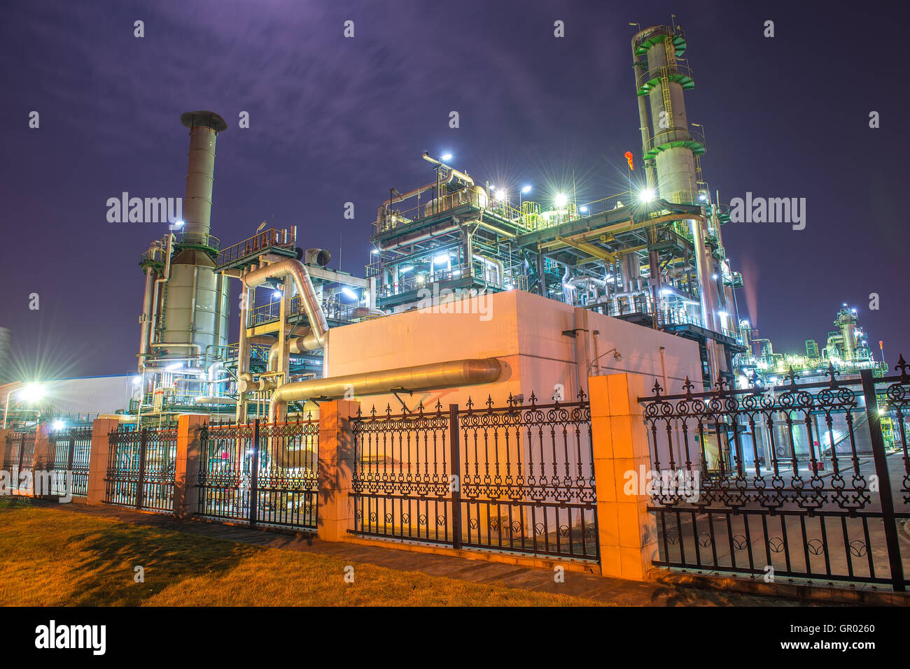 Refinery industrial plant with Industry boiler at night Stock Photo - Alamy