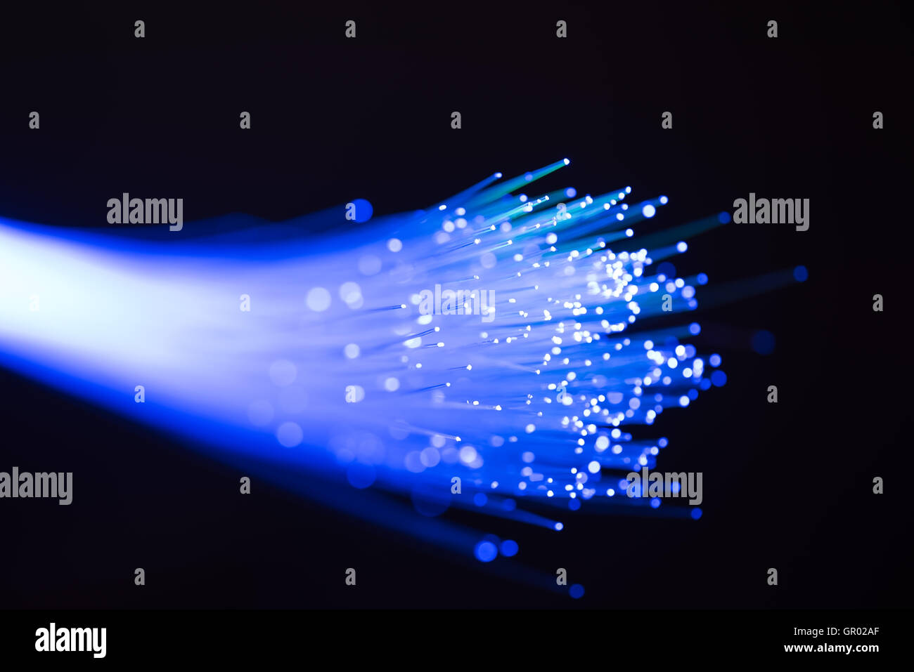 Internet technology fiber optic background Stock Photo - Alamy
