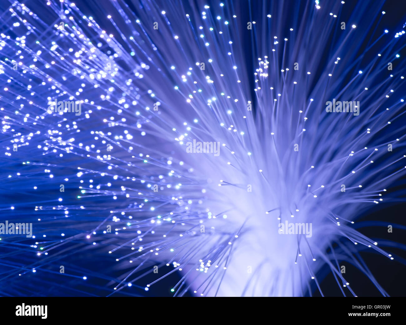 Internet technology fiber optic background Stock Photo - Alamy