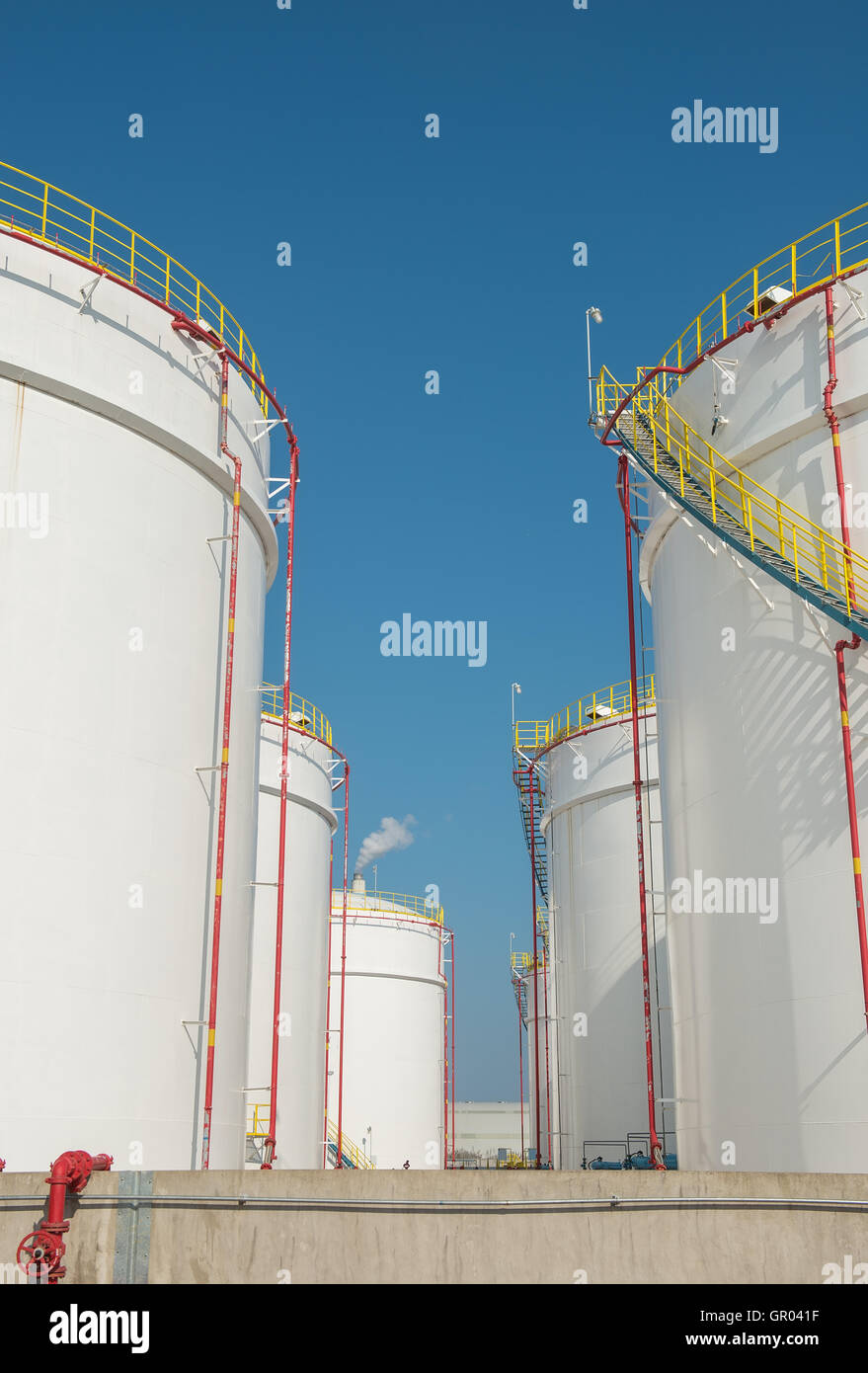 big Industrial oil tanks in a refinery Stock Photo - Alamy
