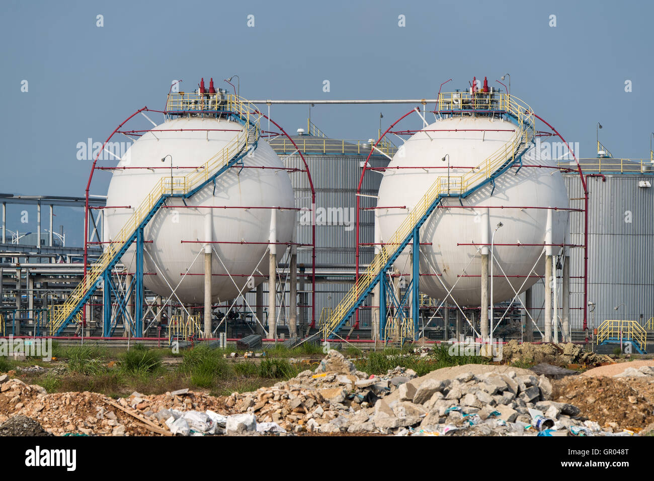 big Industrial oil tanks in a refinery Stock Photo - Alamy