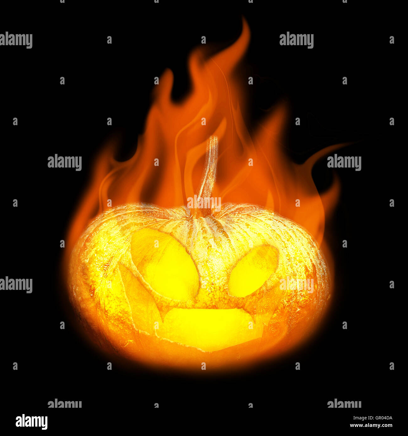 Halloween pumpkin with fire on black background Stock Photo - Alamy