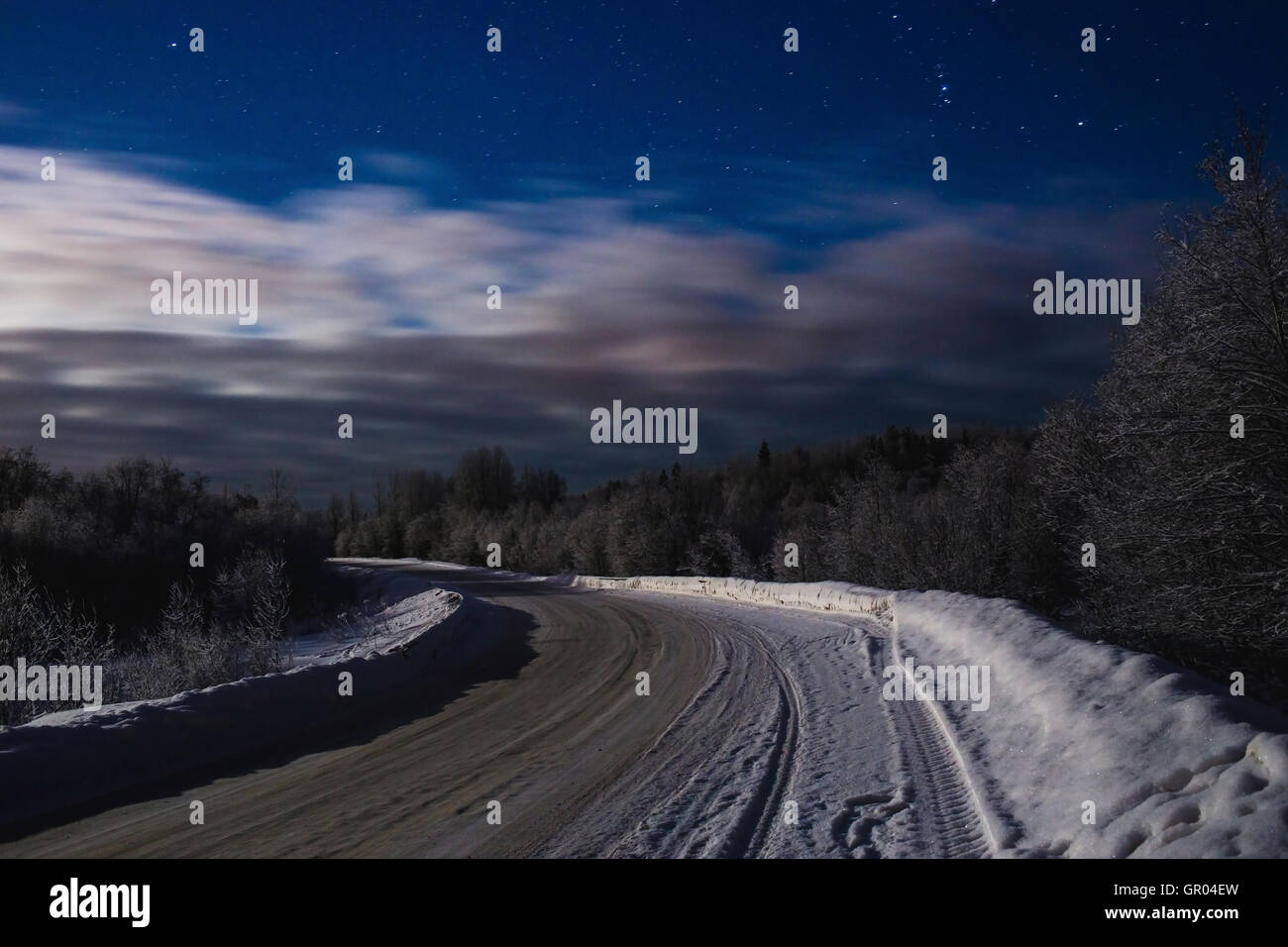 Winter night landscape with stars and the road Stock Photo - Alamy