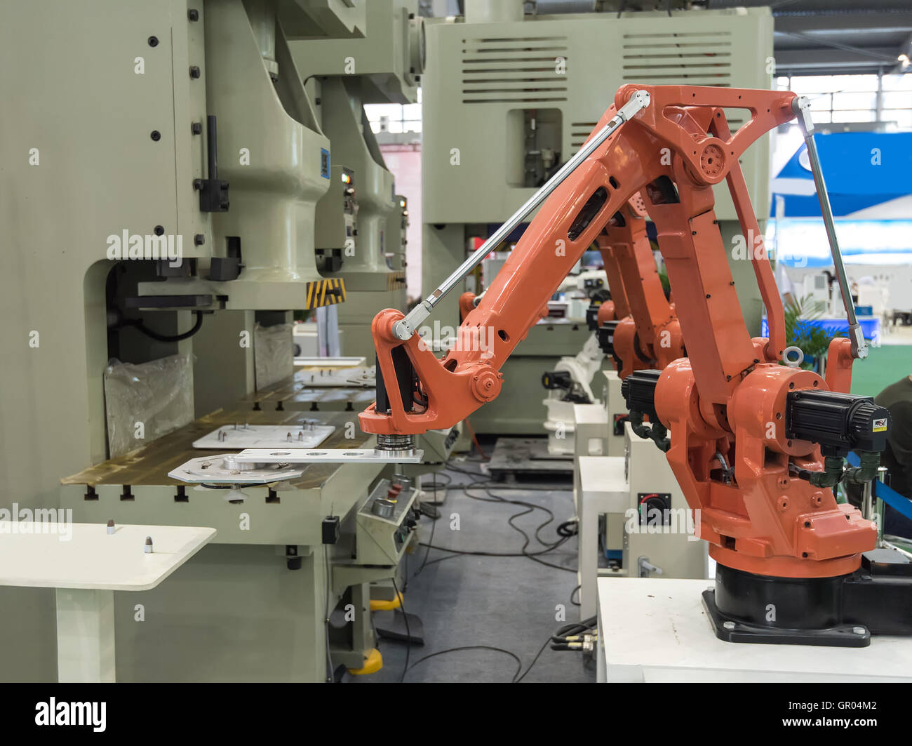 Robotic arm at production line in factory Stock Photo - Alamy
