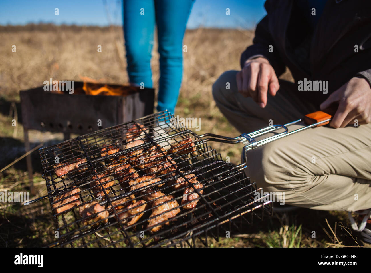 Cooking on the barbecue grill Stock Photo - Alamy