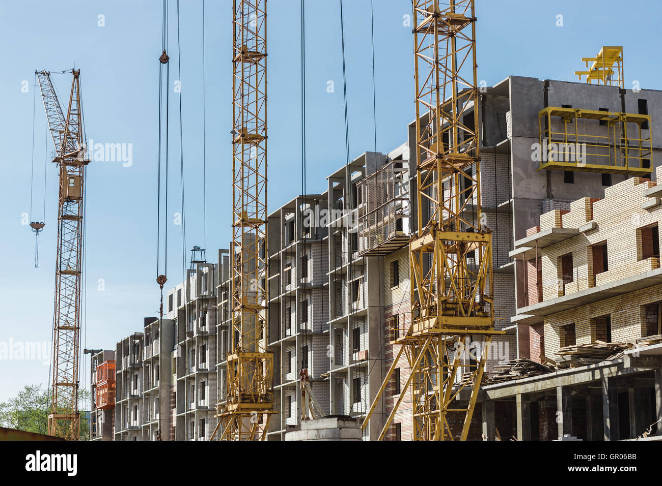 New building is being constructed with use of tower crane Stock Photo ...