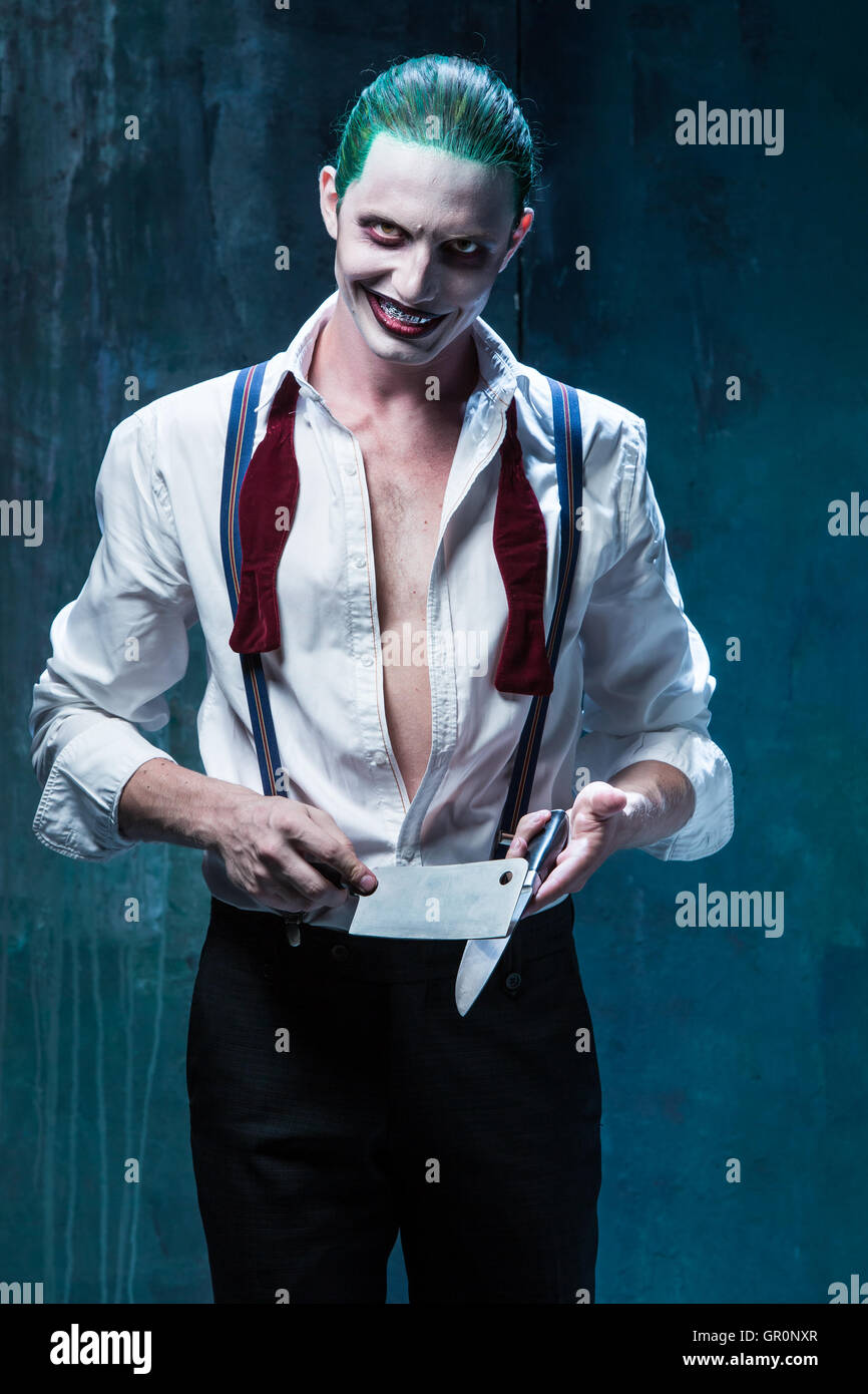 Bloody Halloween theme: crazy joker face Stock Photo - Alamy