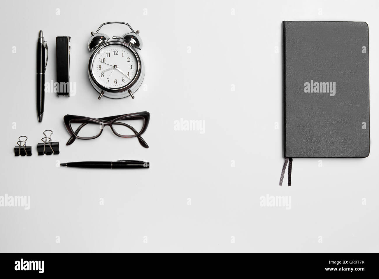 The clock, pen, and glasses on white background Stock Photo - Alamy