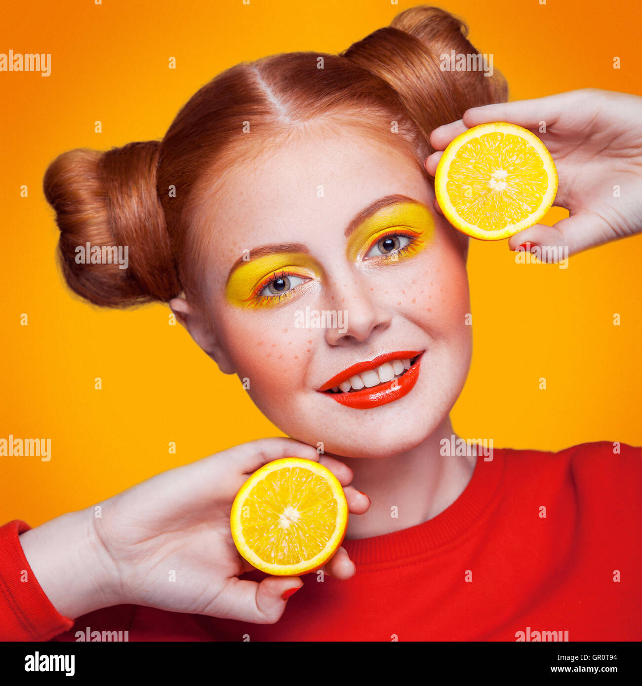Young beautiful fashion model with Lemon. studio shot Stock Photo - Alamy