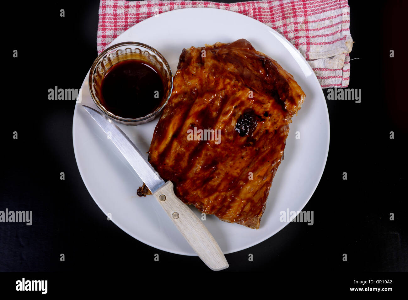 Rack of pork spare ribs and dipping sauce Stock Photo - Alamy