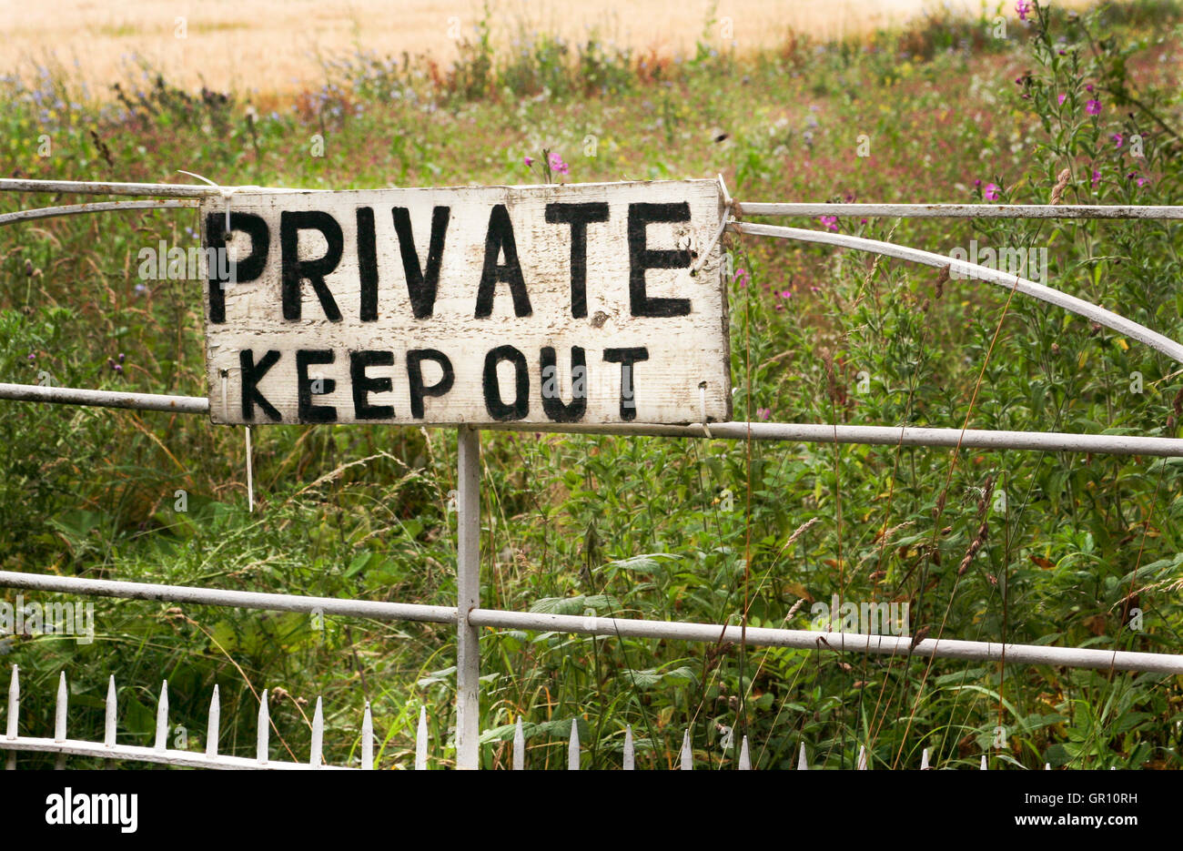 Keep Out Sign On Fence