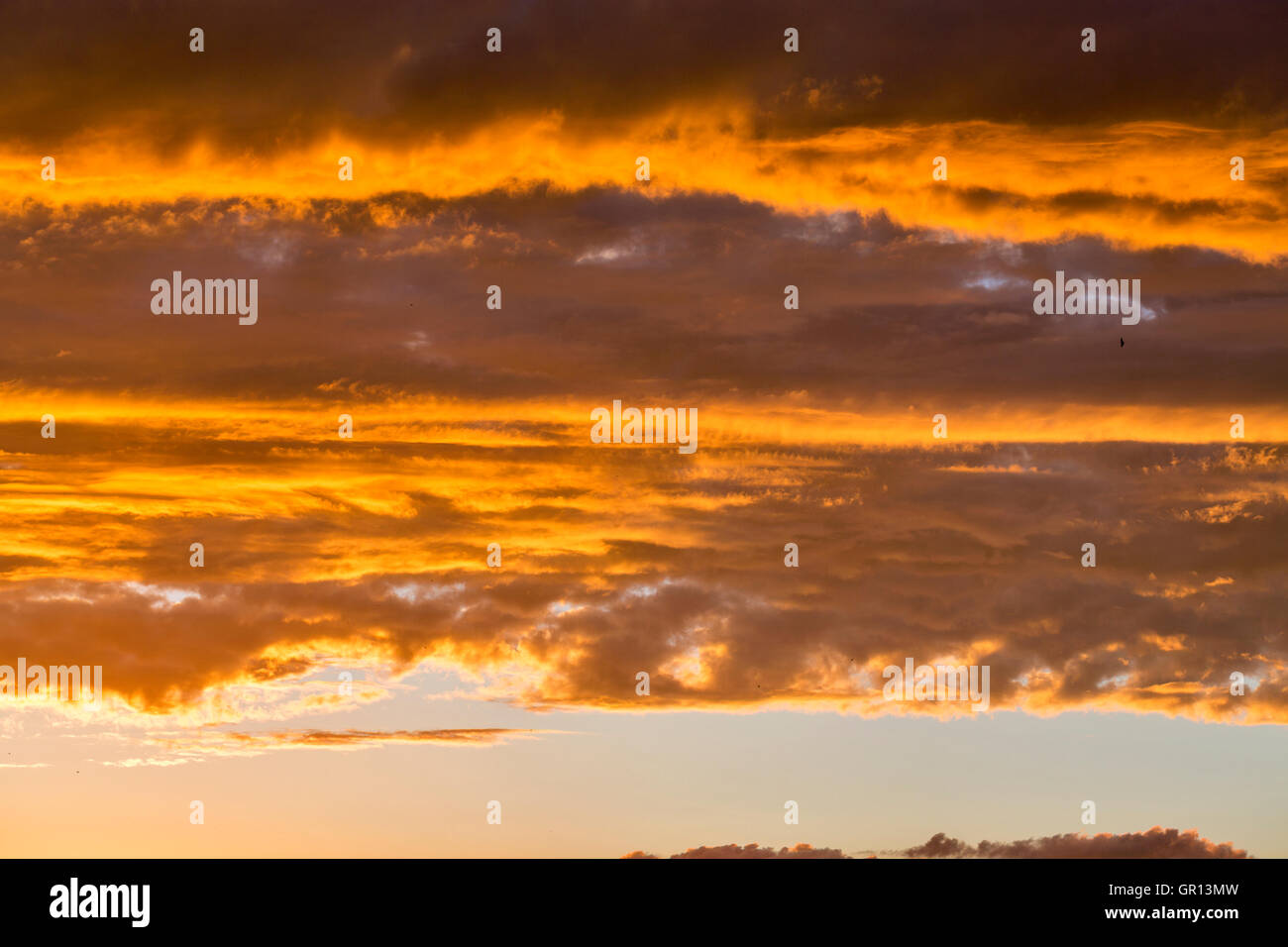 dramatic sunset sky with orange clouds Stock Photo - Alamy