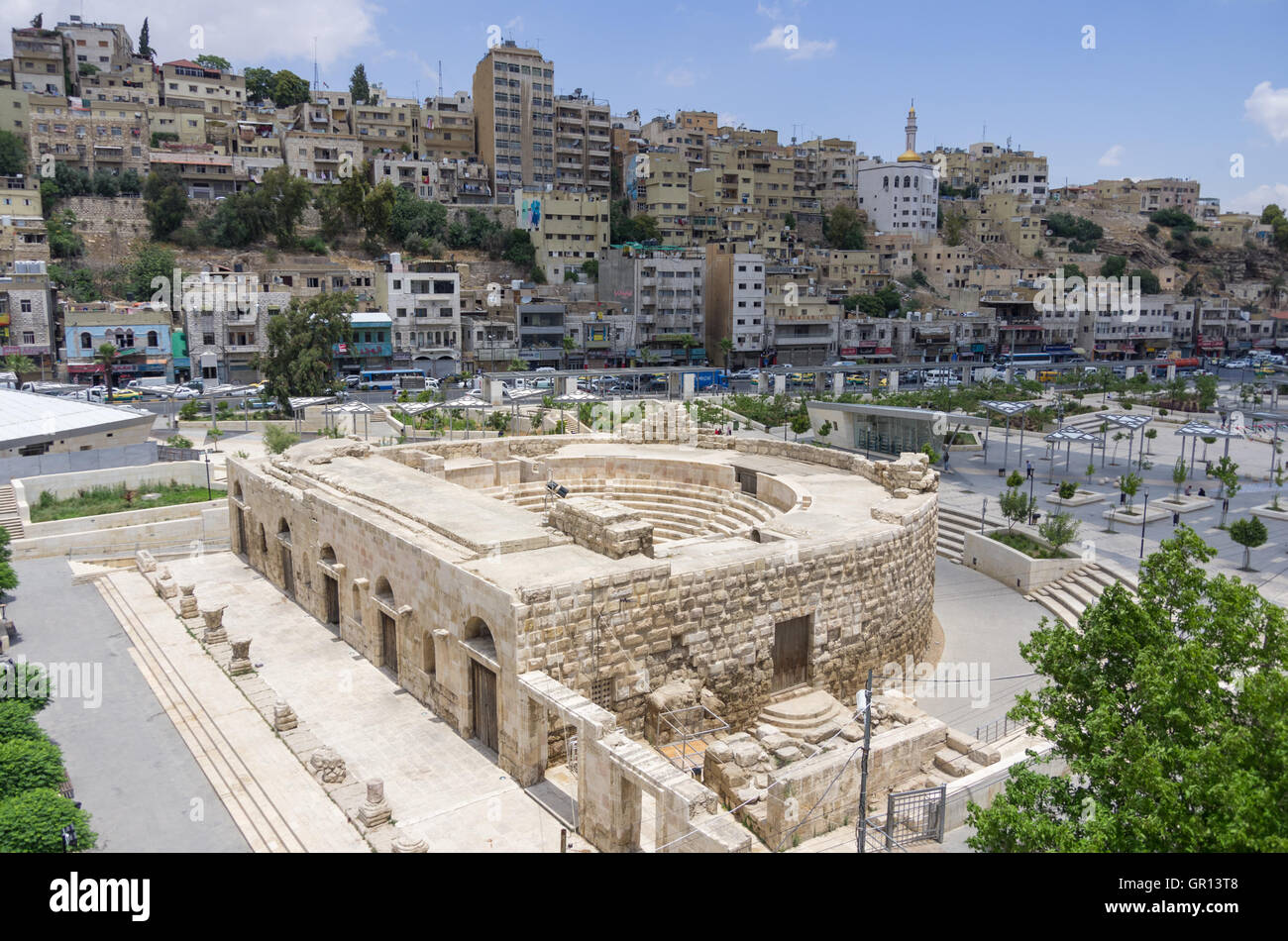 Odeon - little roman amphitheatre in downtown with Amman cityscape ...