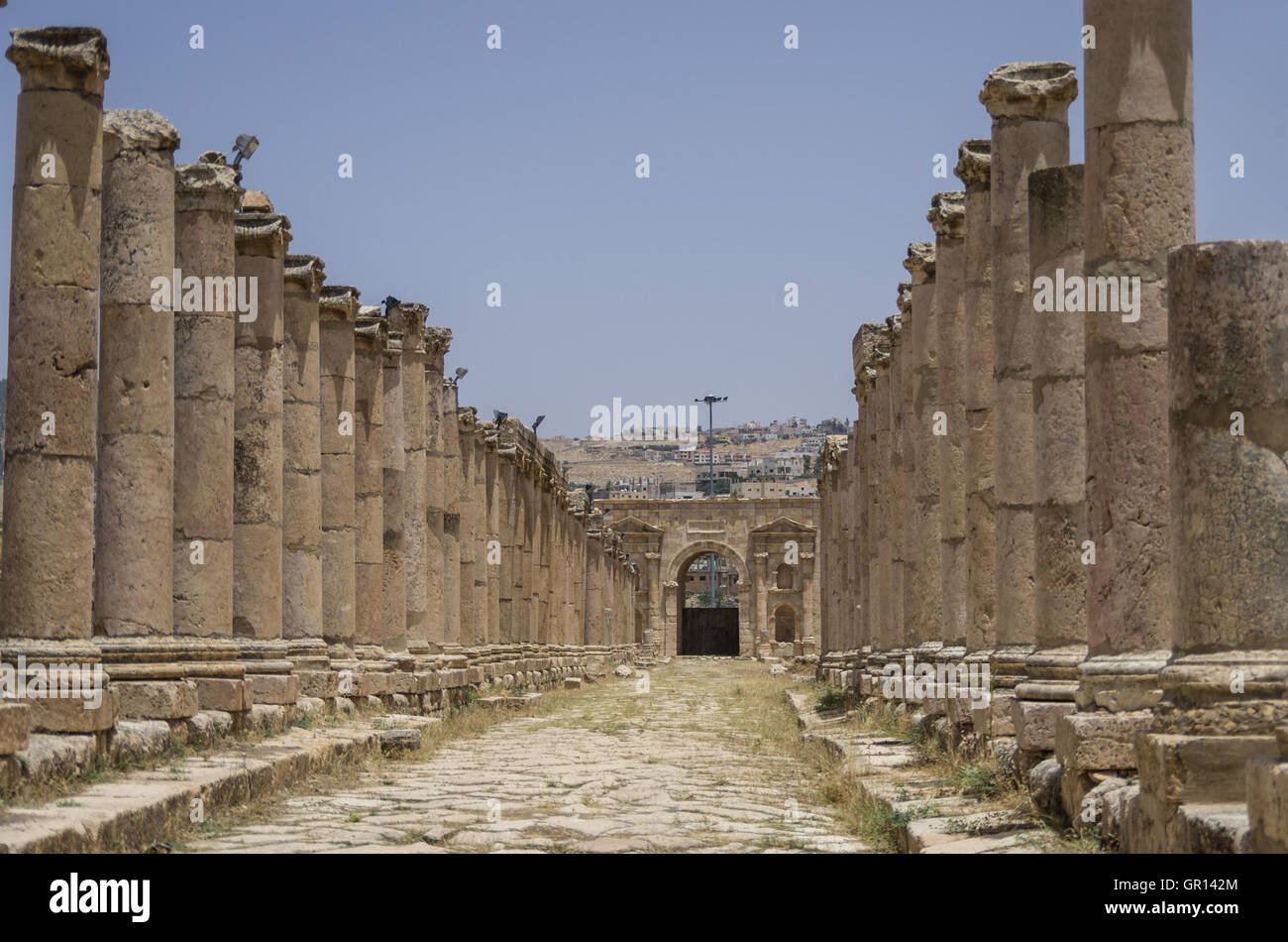 Columns in Colonnaded Street and North Gate at background, Ancient ...
