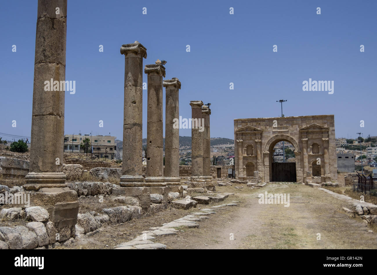Columns in Colonnaded Street and North Gate at background, Ancient ...