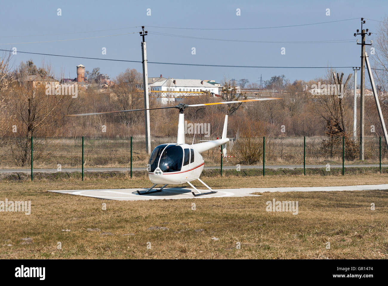 Robinson 44 helicopter landed hi-res stock photography and images - Alamy