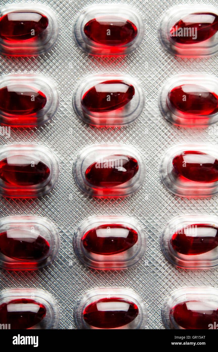 Red capsule hi-res stock photography and images - Alamy