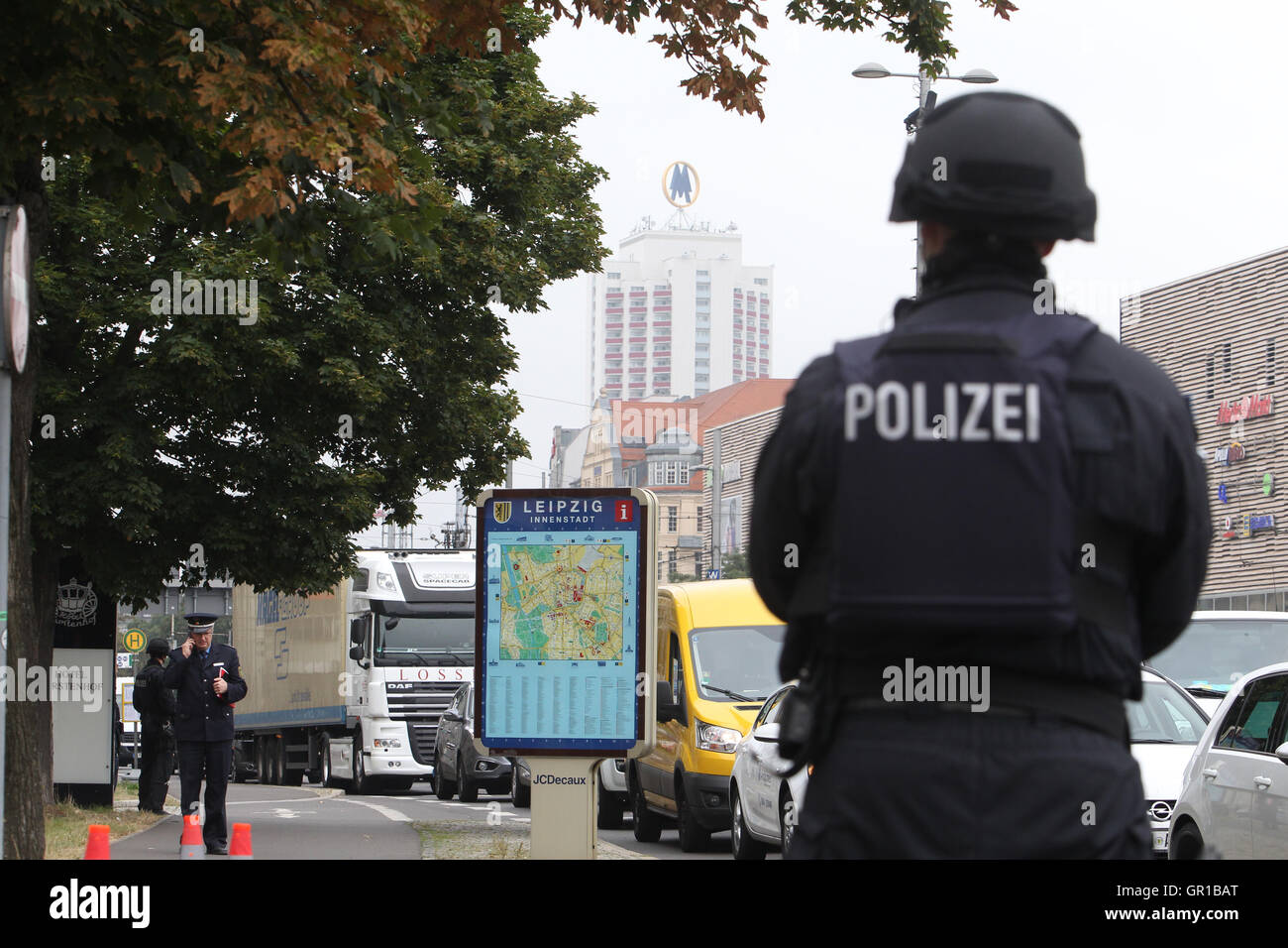 Leipzig, Germany. 06th Sep, 2016. A police officer in a helmet and ...