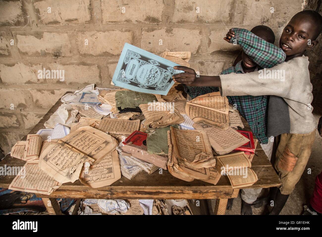Dakar, Senegal. 25th June, 2015. Talibes play with education materials ...