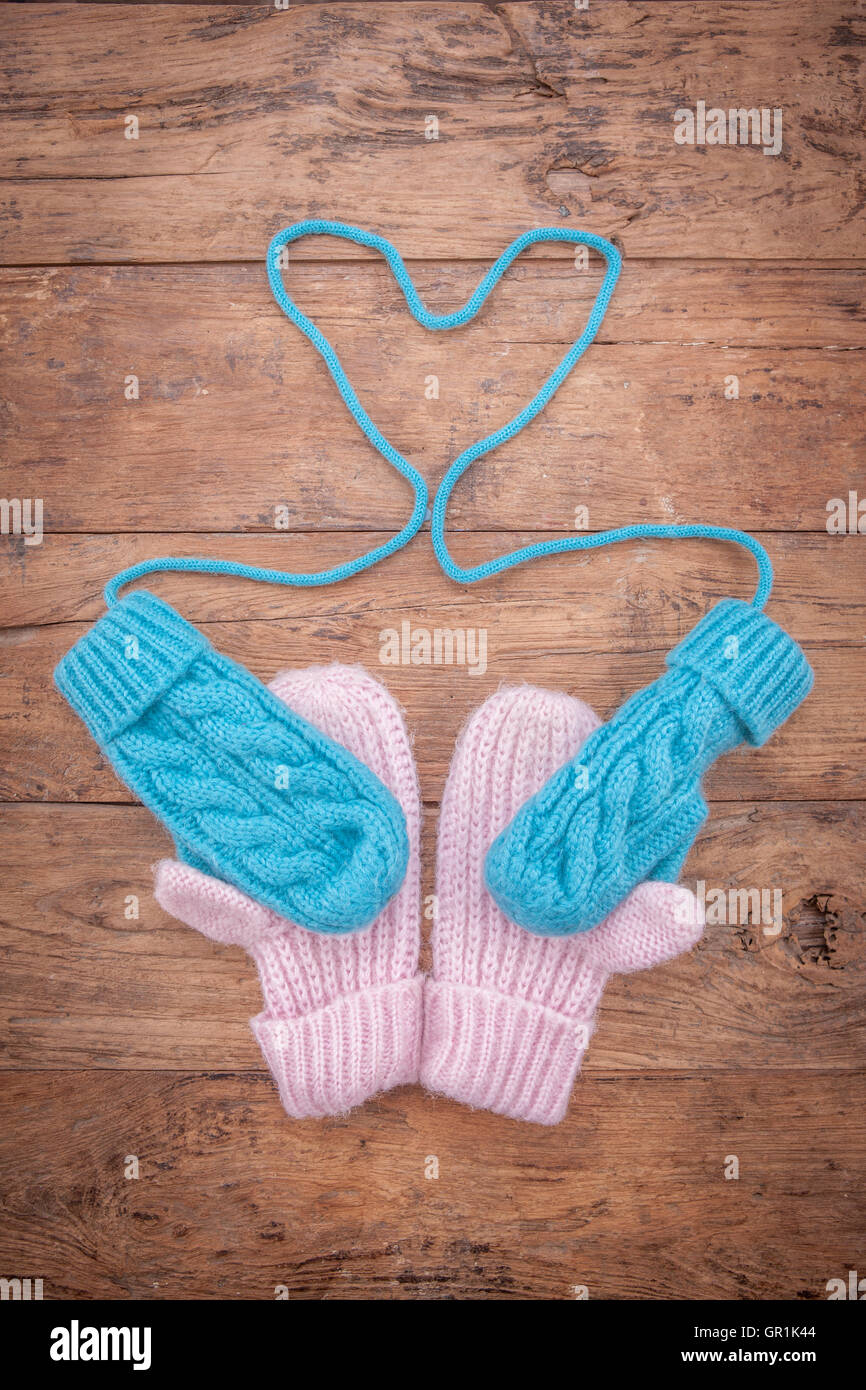 Two pairs of mittens Stock Photo - Alamy