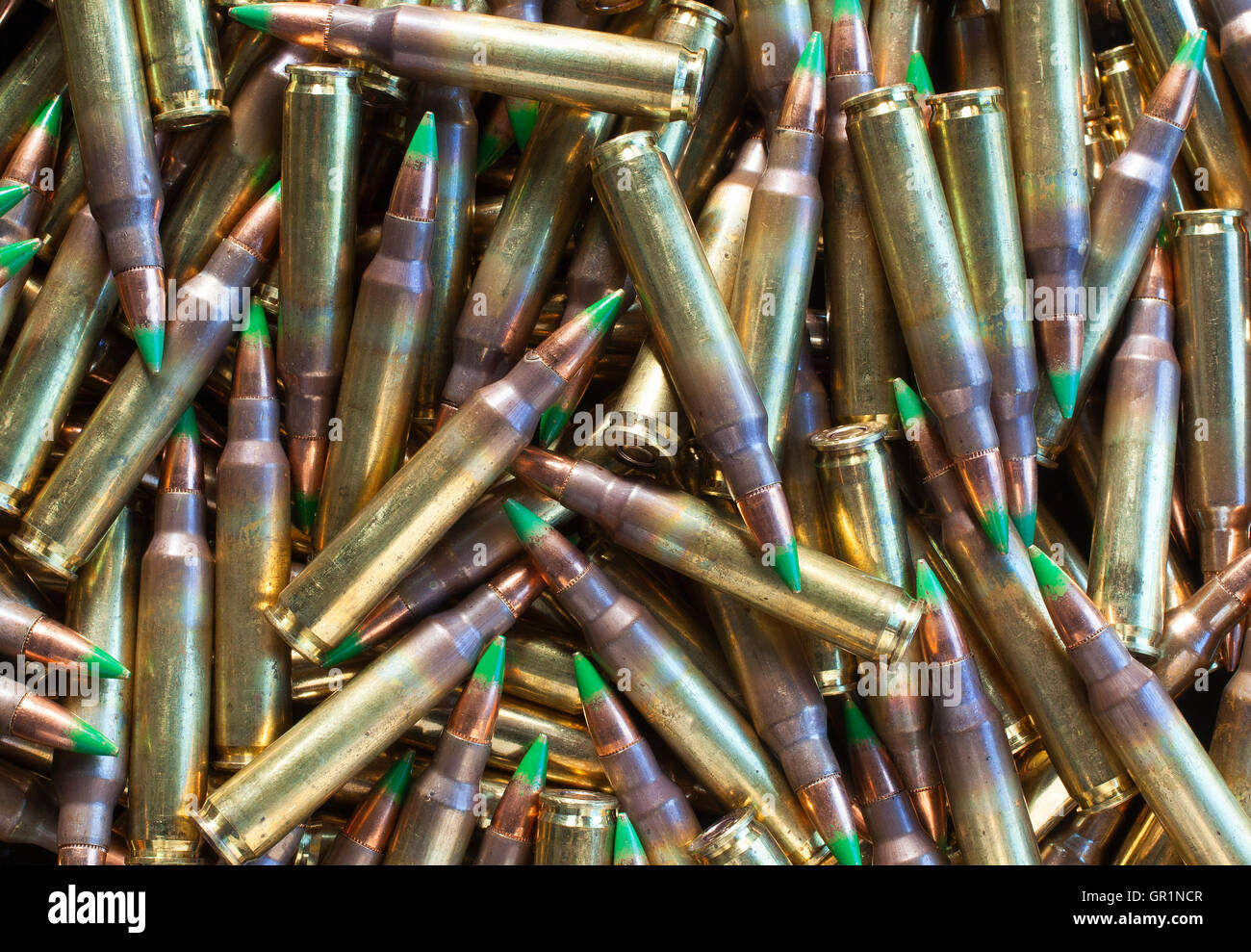 Cartridges for use in a rifle with bullets that have green tips Stock ...