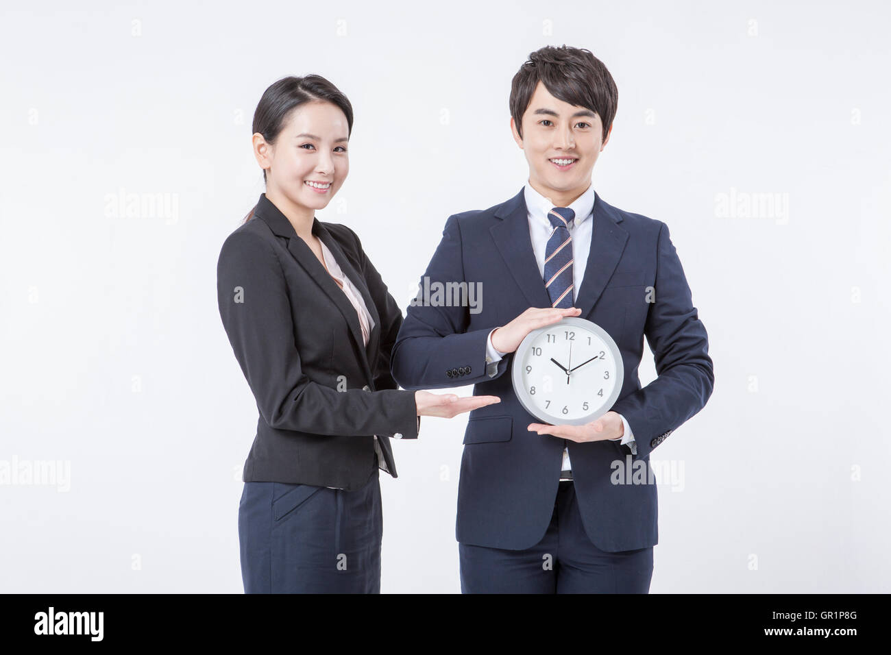 Smiling clock hi-res stock photography and images - Alamy