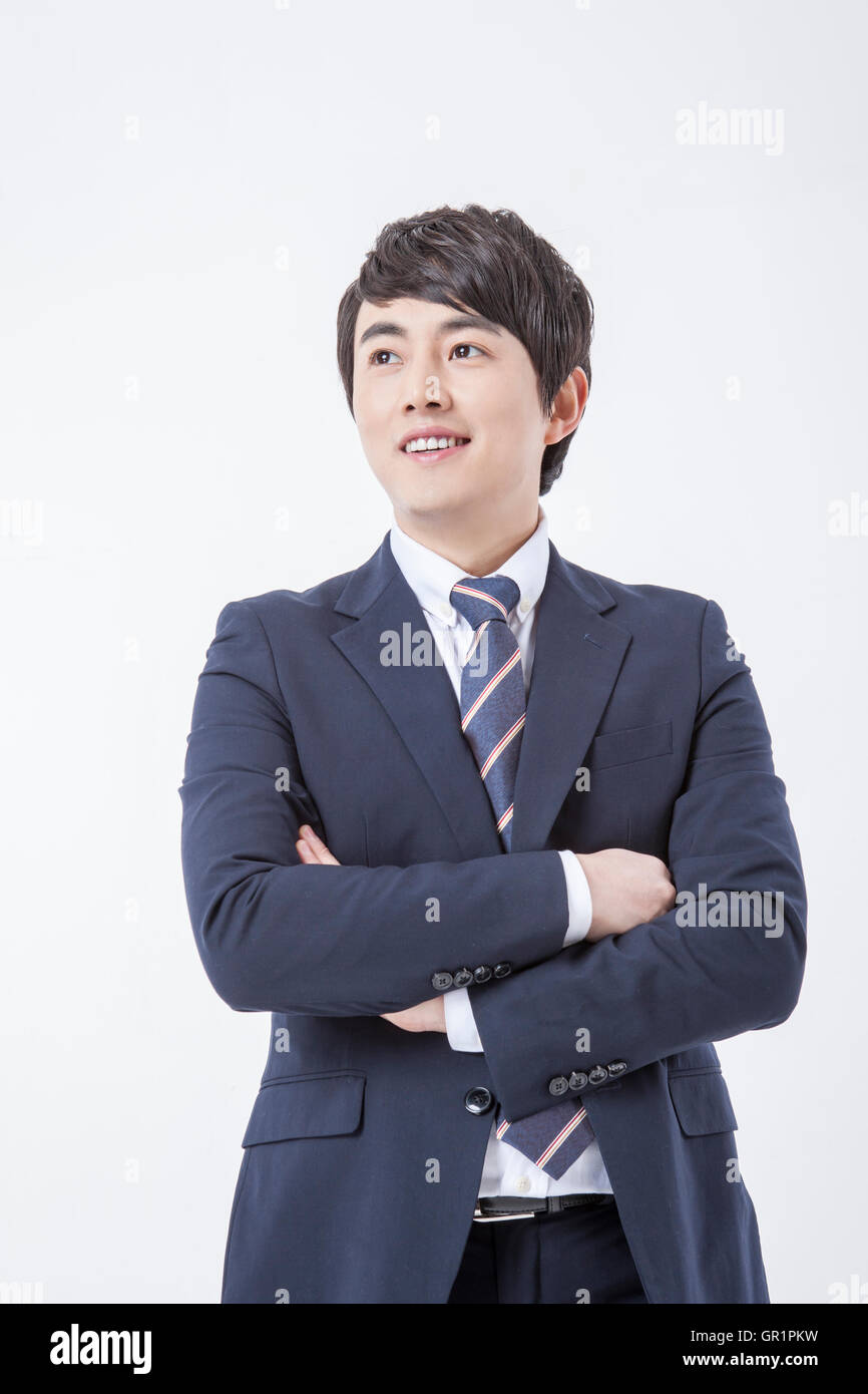 Businessman folding arms hi-res stock photography and images - Alamy