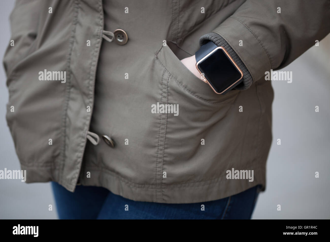 Woman wearing smart watch on her hand on the street. This new ...