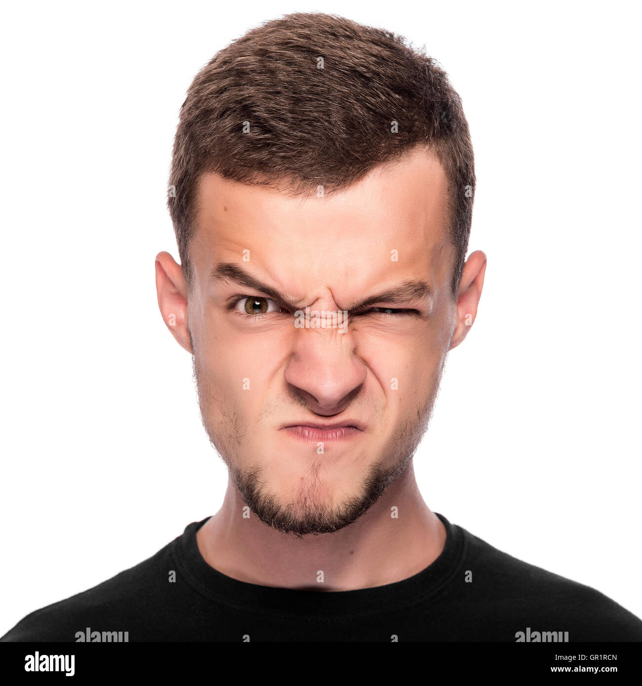 Stressful young man isolated on white background Stock Photo - Alamy