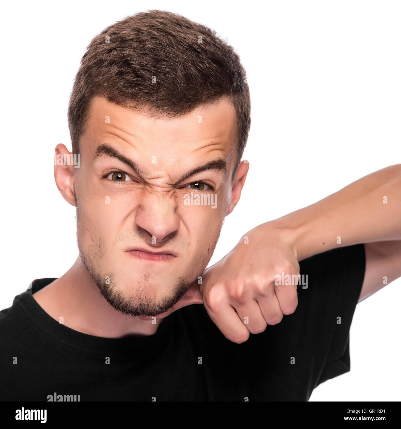 Young man gesturing a cutting motion on her throat over white ...