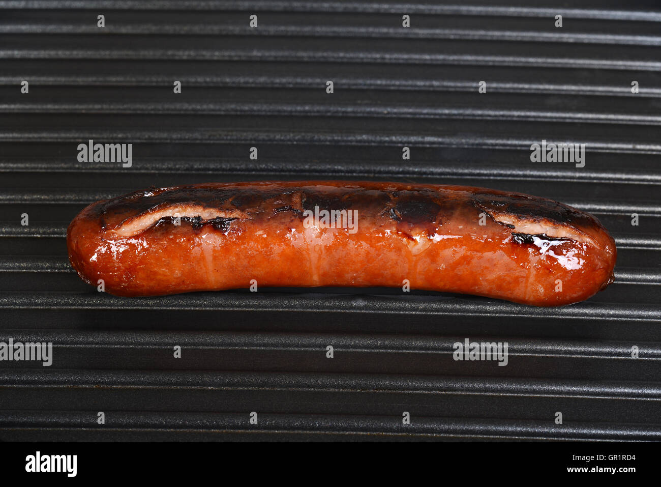 closeup of sausage cooking on a grill Stock Photo - Alamy