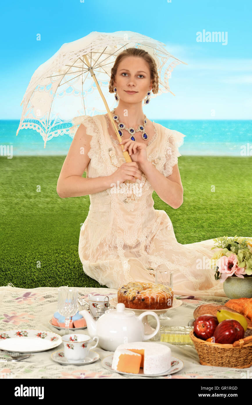 young Edwardian woman at picnic with umbrella Stock Photo - Alamy