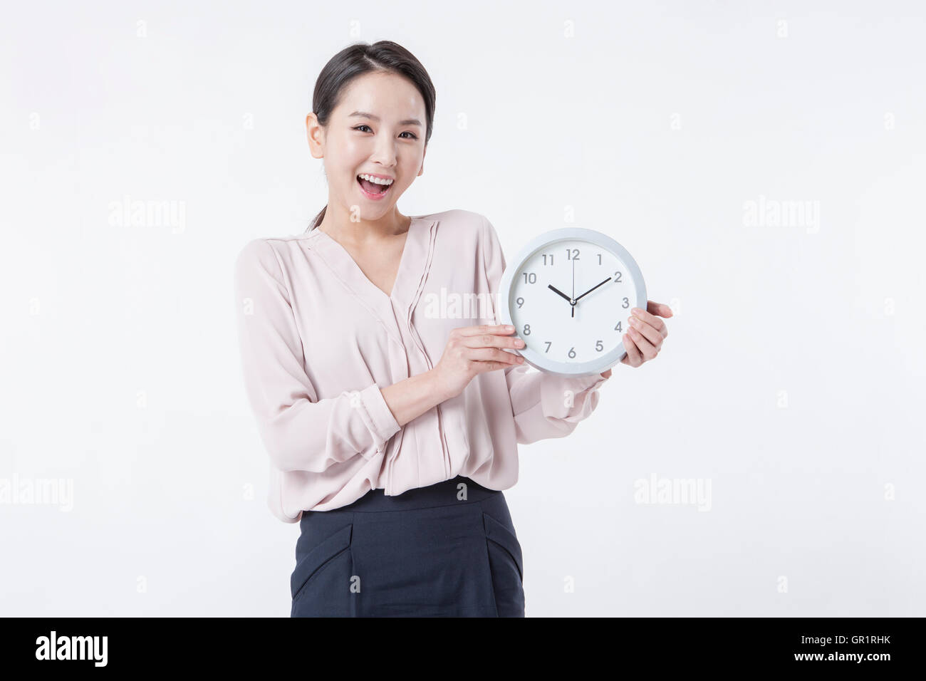 Smiling clock hi-res stock photography and images - Alamy