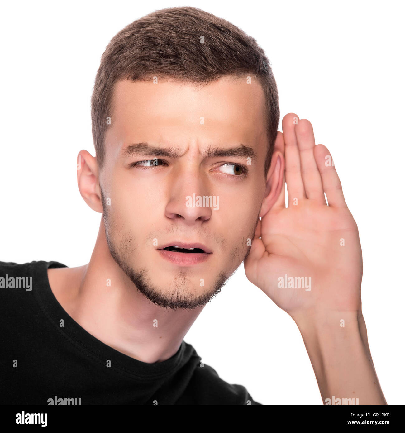 Putting hand to her ear hi-res stock photography and images - Alamy