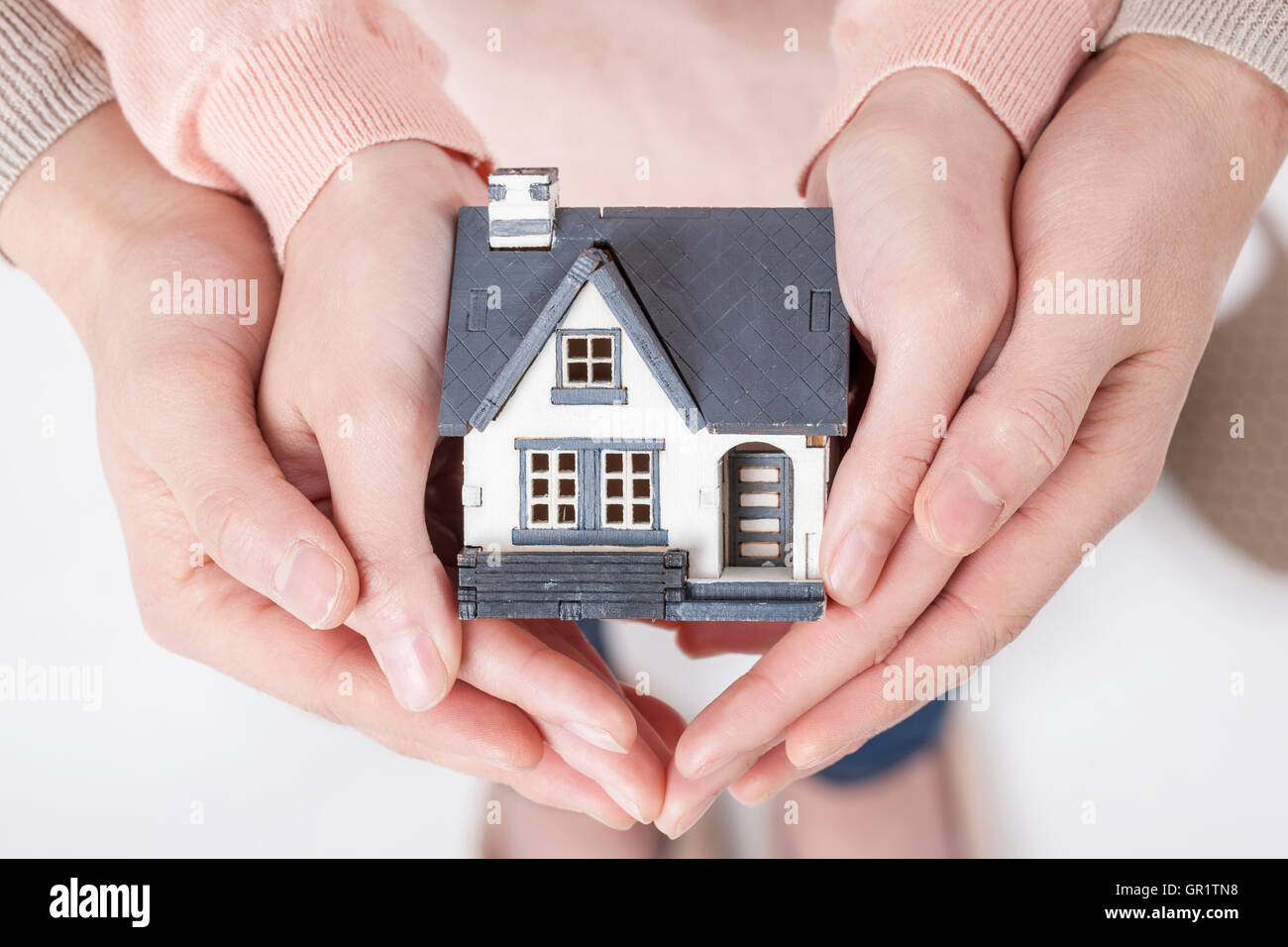 Hands model house hi-res stock photography and images - Alamy
