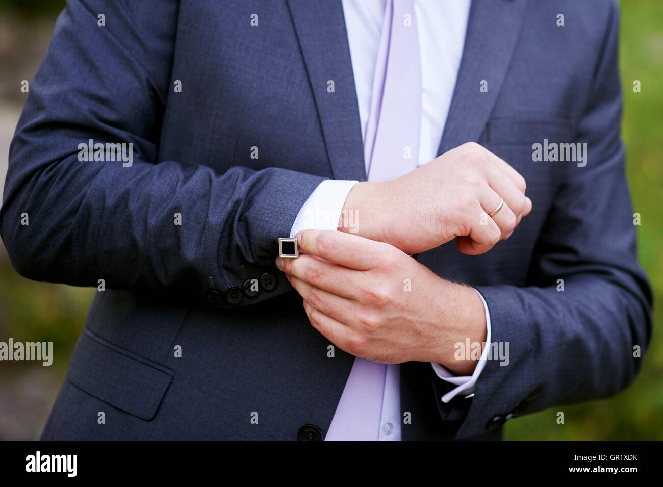 Black hand in suit hi-res stock photography and images - Alamy