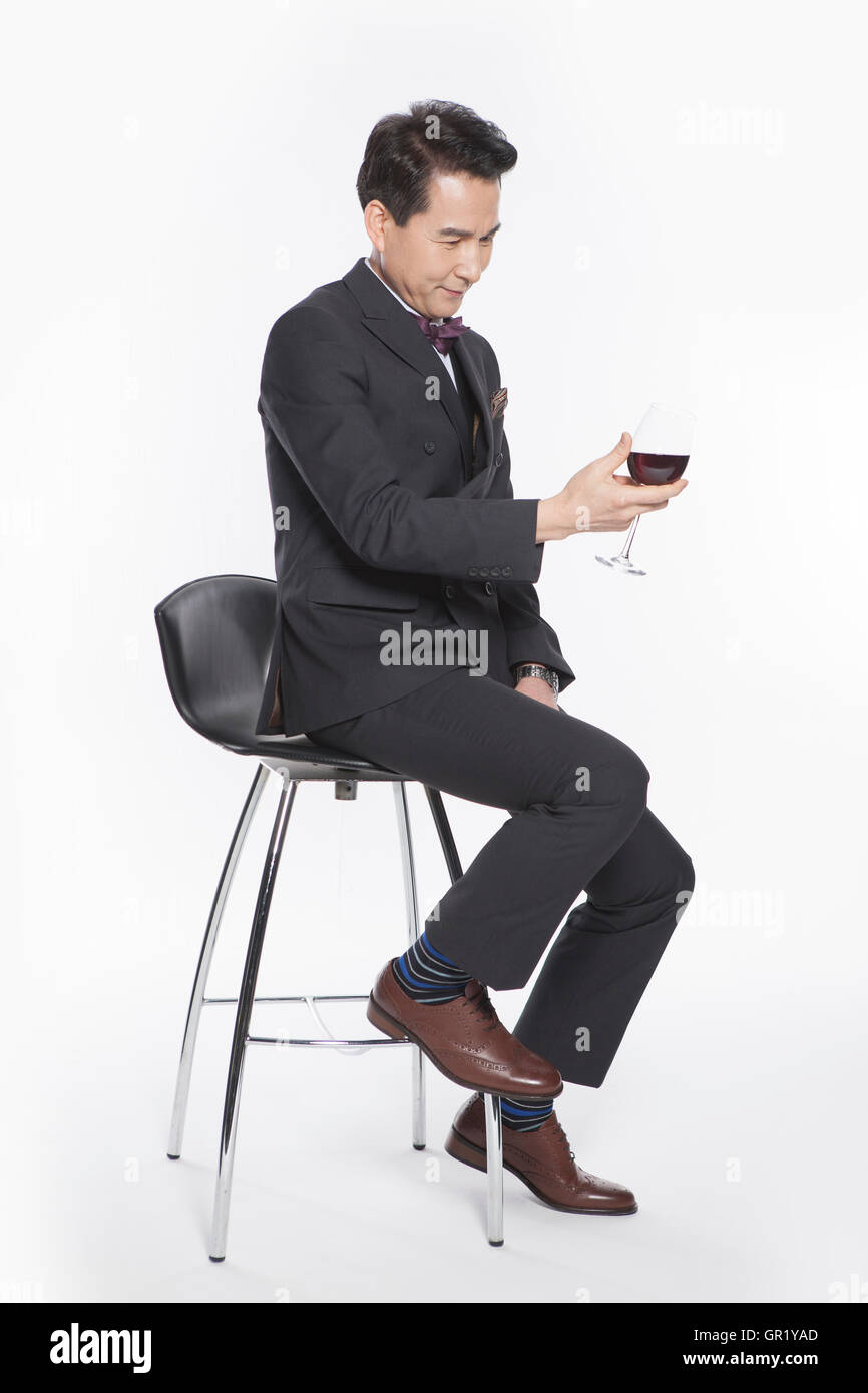 Man sitting side view suit hi-res stock photography and images - Alamy