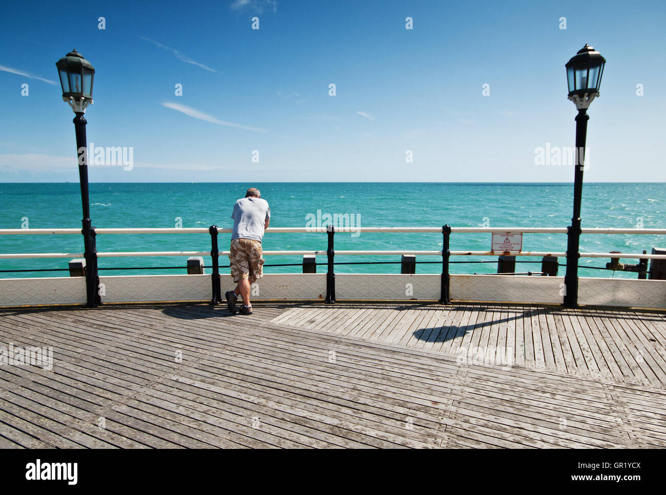 Man contemplating the sea during a sunny summer day in the Worthing ...
